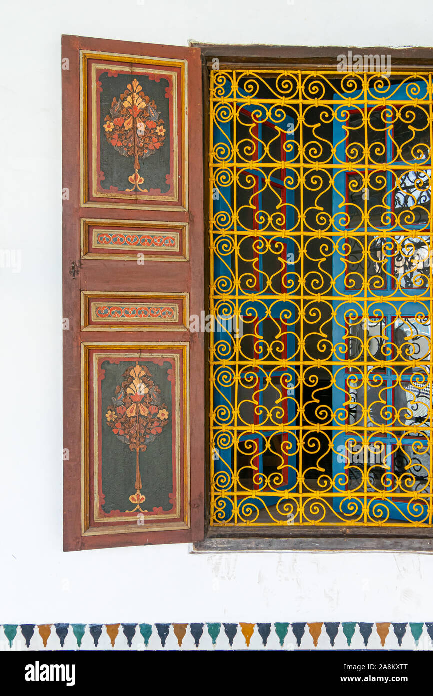 Detail of yellow decorative fence of a window of the Bahia palace in ...