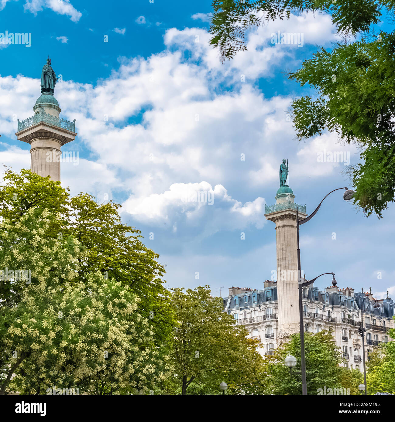 Paris, place de la Nation, typical buildings and the column and statue ...