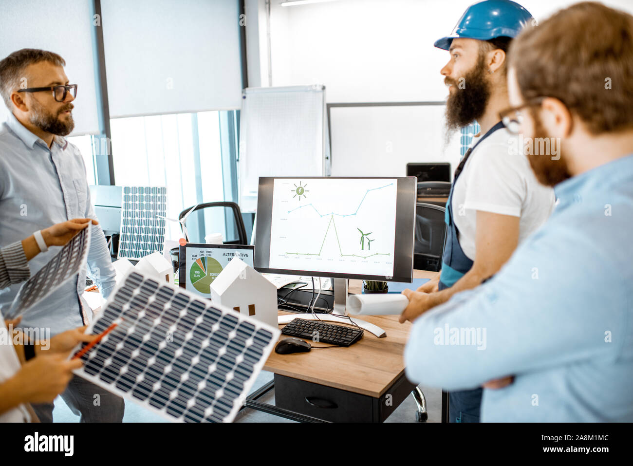 Engineers discussing office hi-res stock photography and images - Alamy