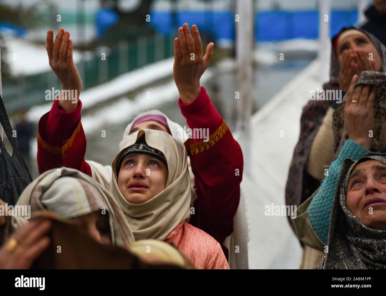 Kashmiri Muslim devotees cry as they raise hands while beseeching for ...
