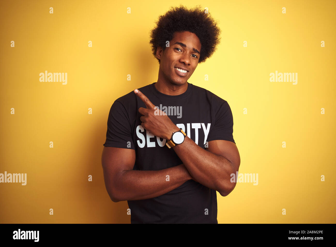 American safeguard man with afro hair wearing security uniform over ...