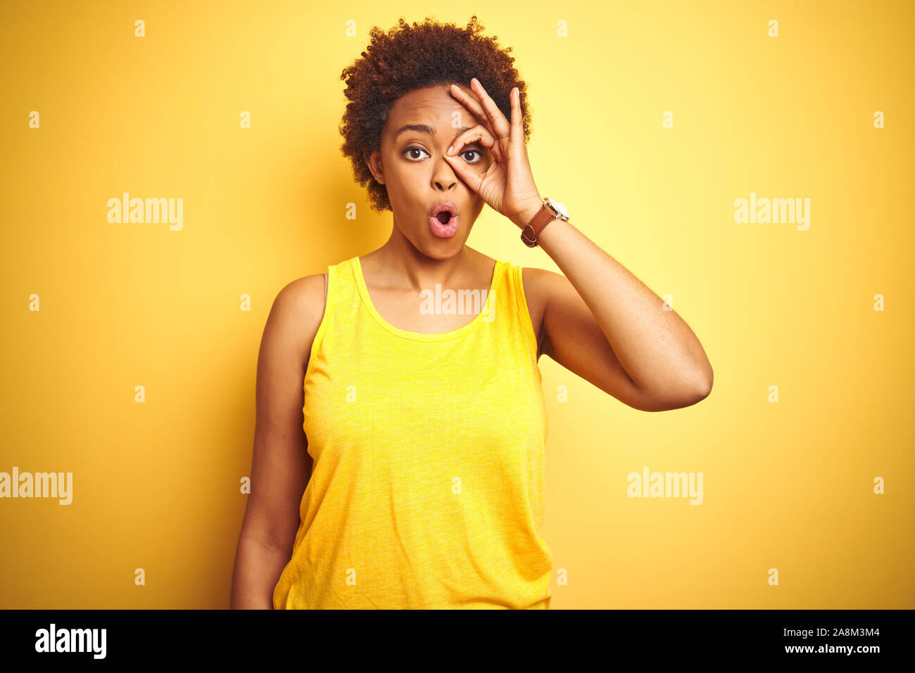 Beauitul african american woman wearing summer t-shirt over isolated ...