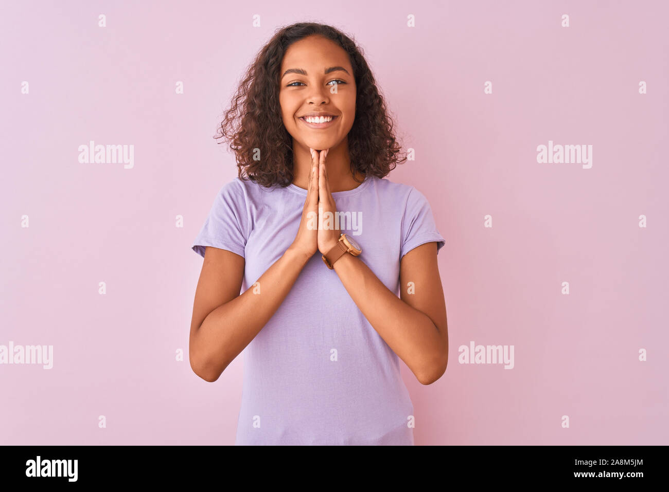 Young Brazilian Woman Wearing T Shirt Standing Over Isolated Pink