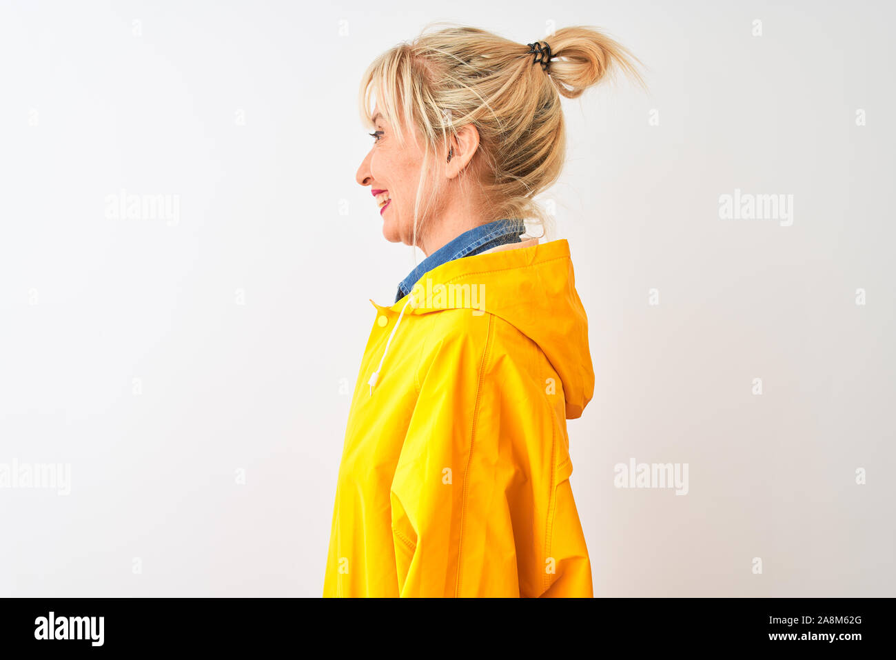Side view woman wearing raincoat hi-res stock photography and images ...