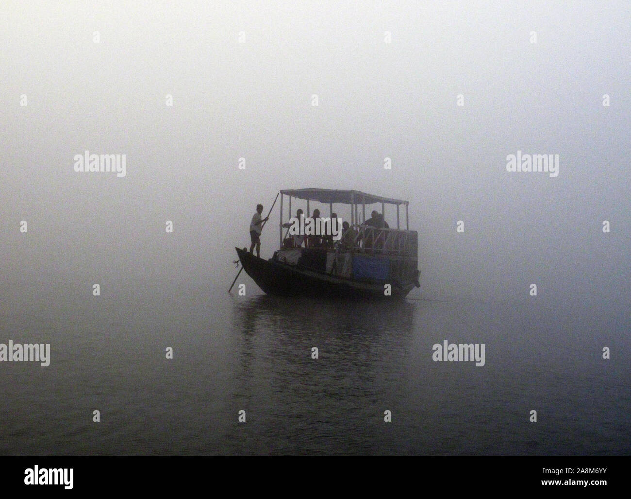 Misty morning on the holiest of rivers in India. Ganges delta in ...