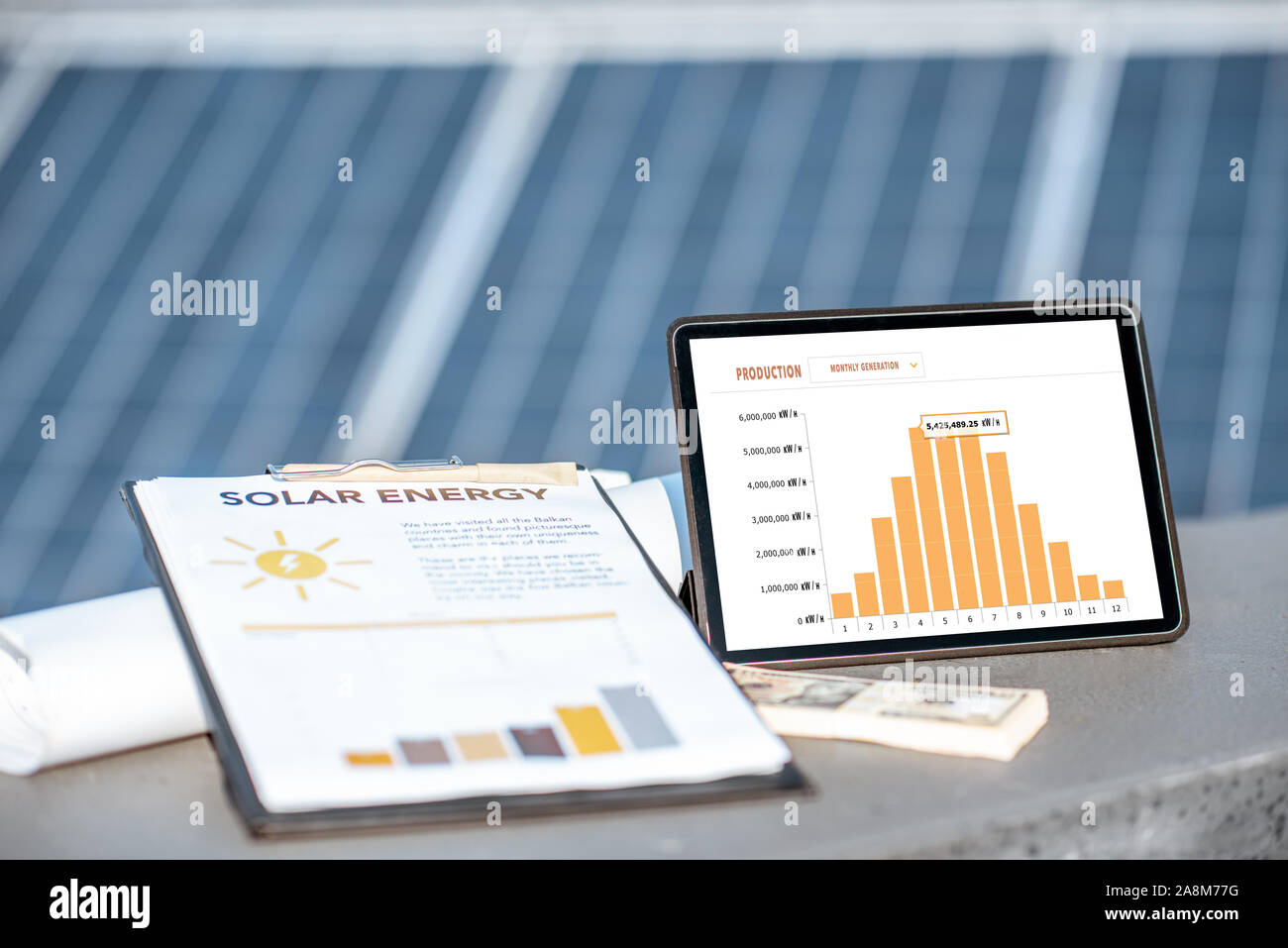 Composition of drawings and digital tablet with a chart of electricity ...