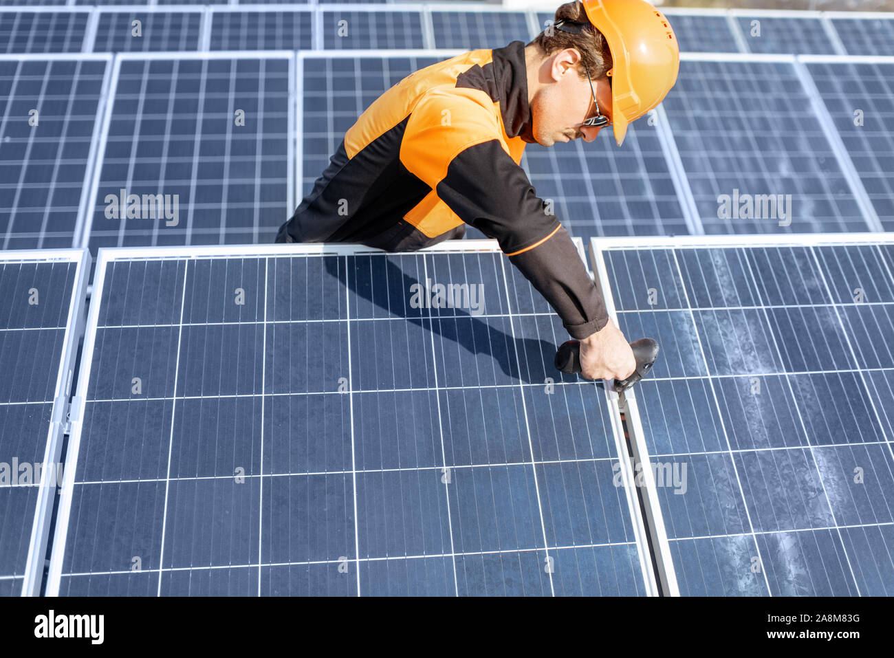 Technician working in solar plant hi-res stock photography and images ...