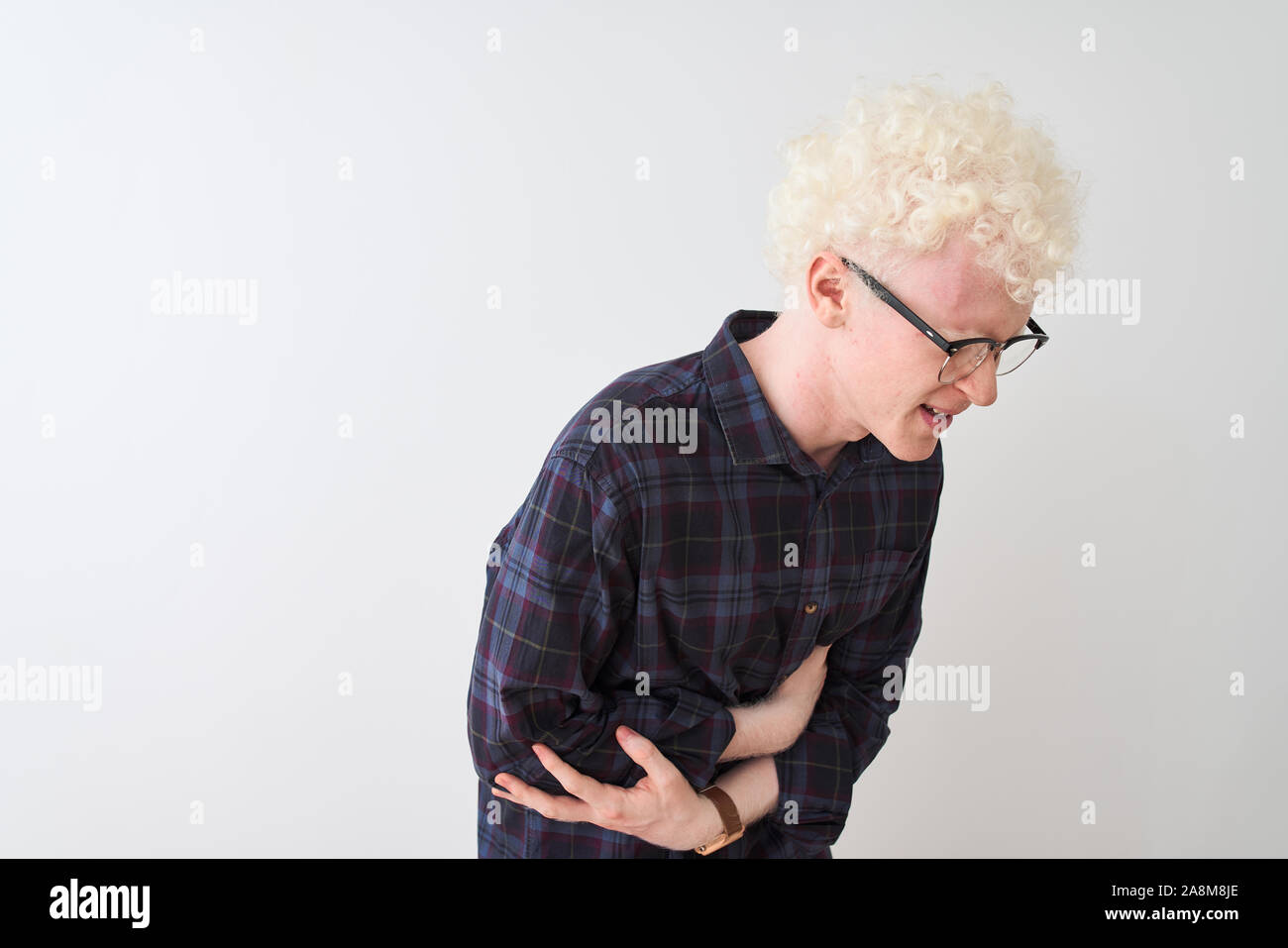 Young albino blond man wearing casual shirt and glasses over isolated ...