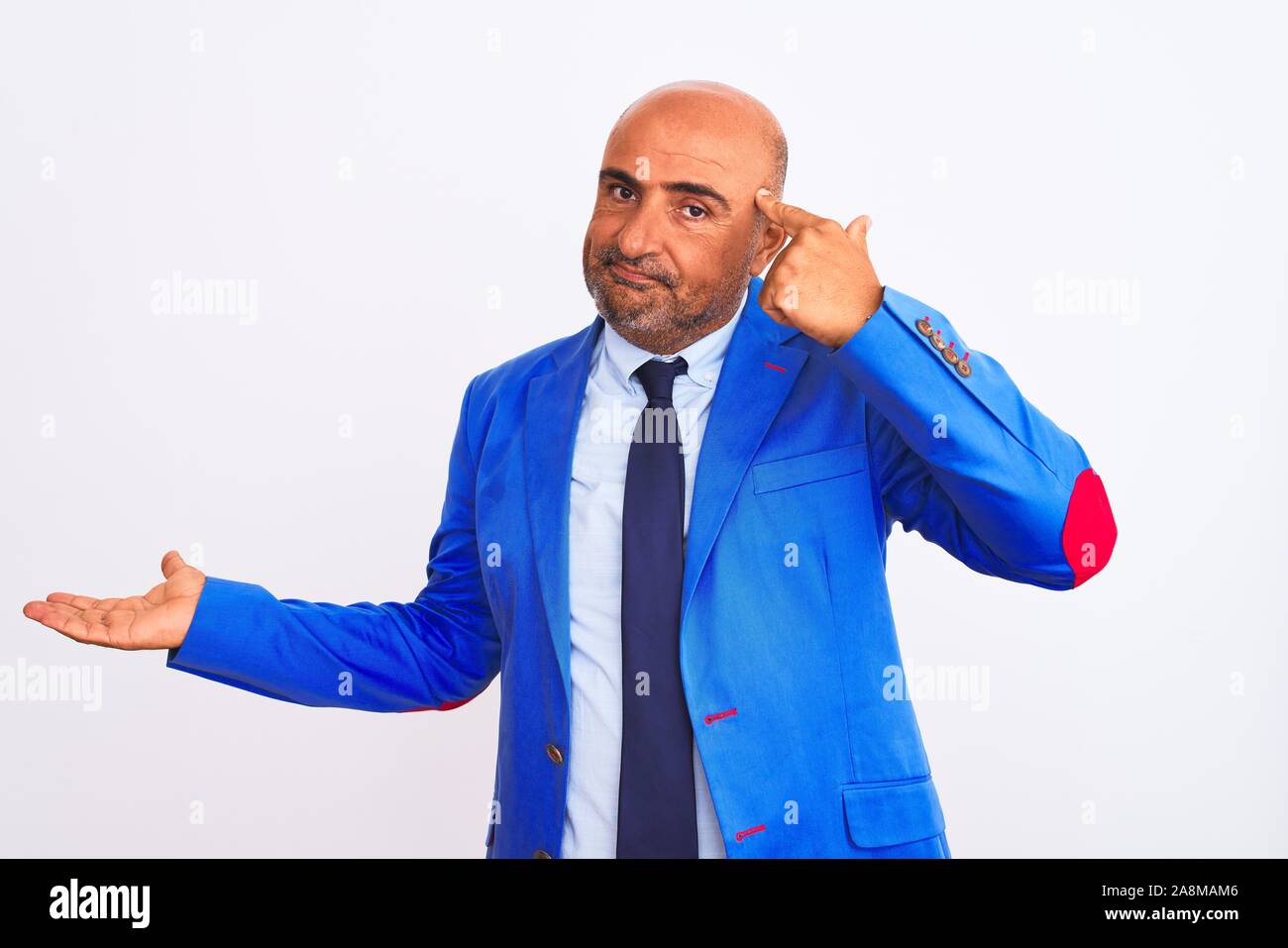 Middle age businessman wearing suit standing over isolated white ...