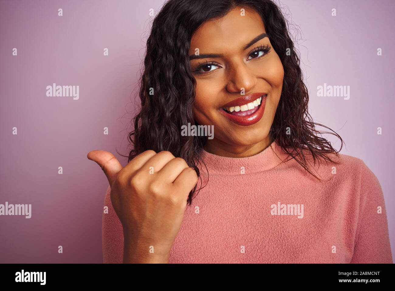 Young beautiful transsexual transgender woman standing over isolated ...