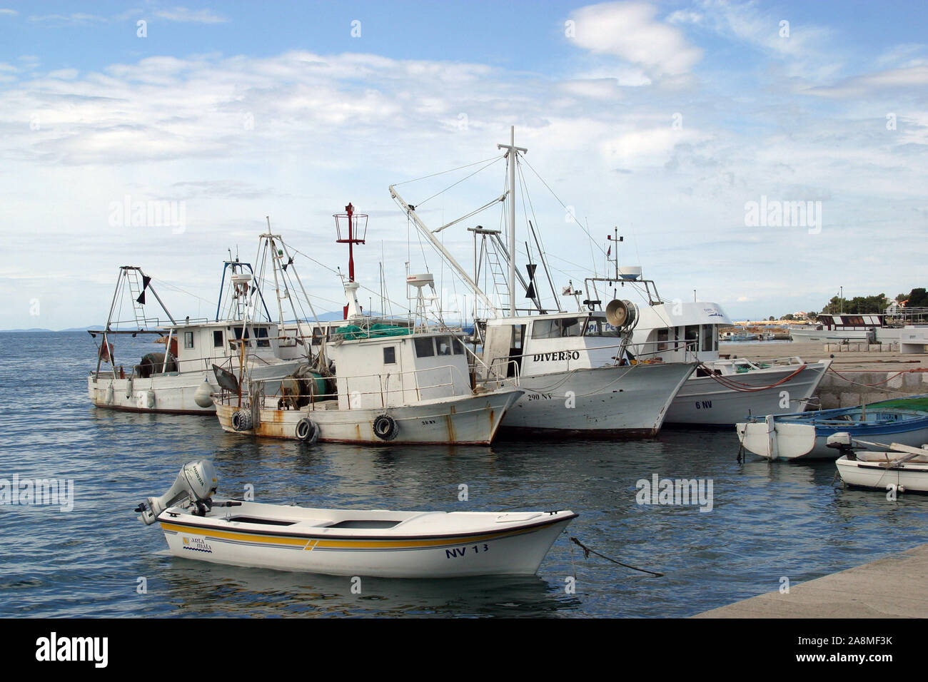 Anchored fishing vessels hi-res stock photography and images - Alamy
