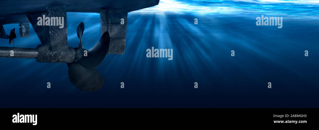 Twin propeller and rudder of big ship underway from underwater. Close ...