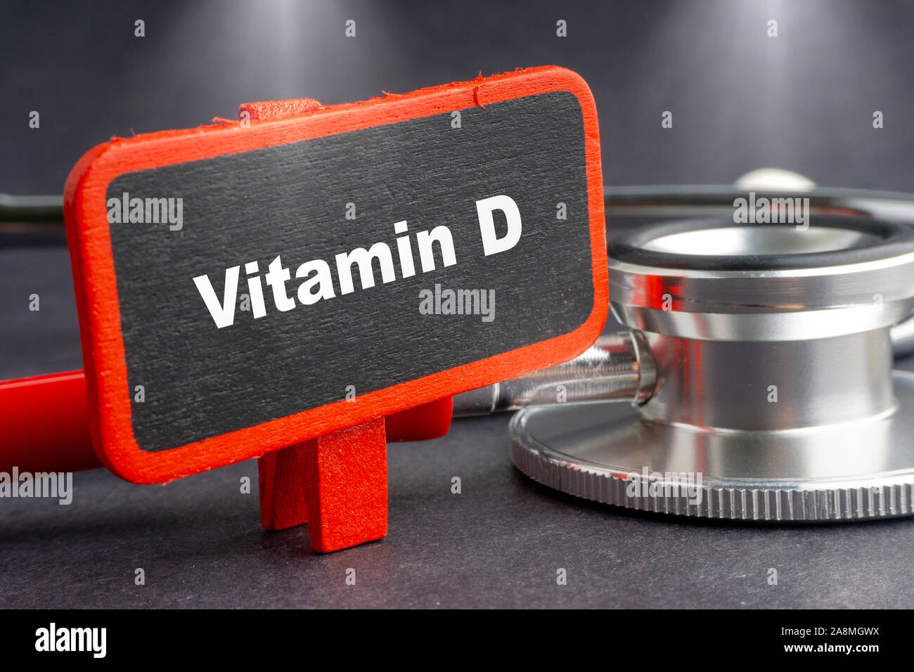 VITAMIN D. Medicine concept. Blackboard with word VITAMIN D and ...