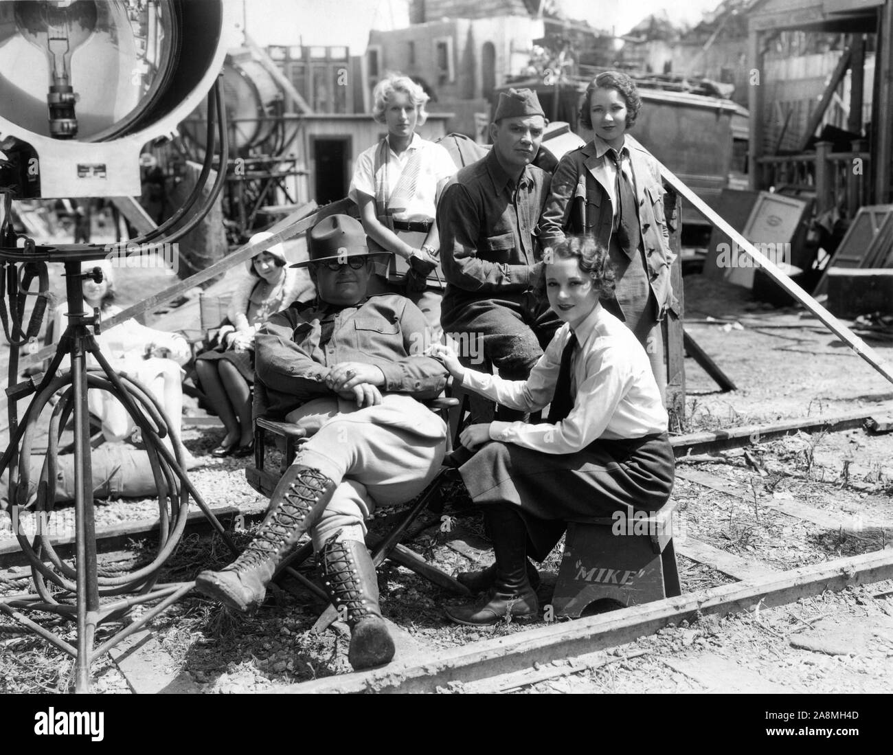 Director EDWARD SEDGWICK SALLY EILERS and CLIFF EDWARDS on set candid ...