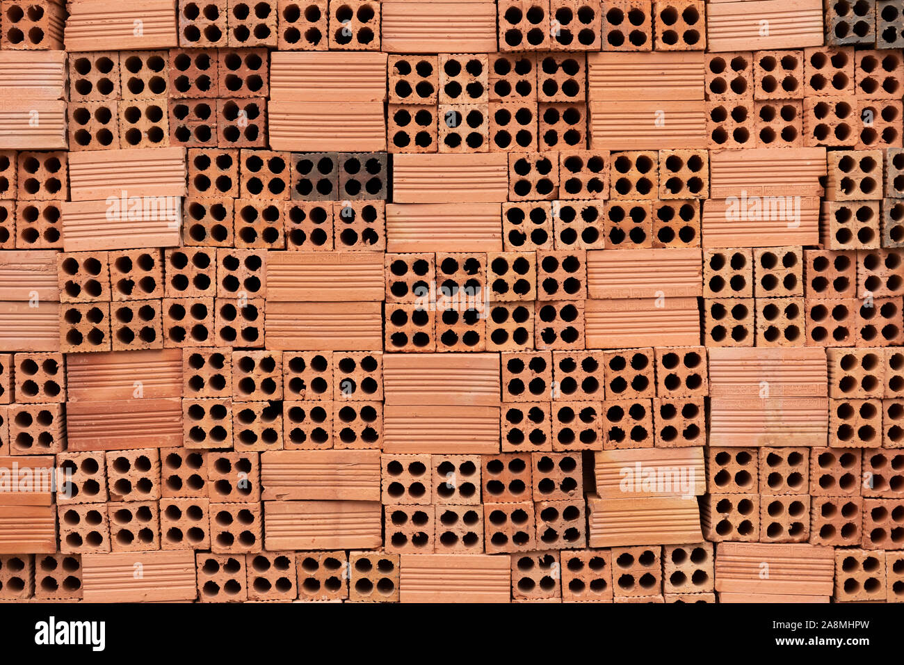 Red Clay or Terracotta bricks stacked neatly on a building site Stock ...