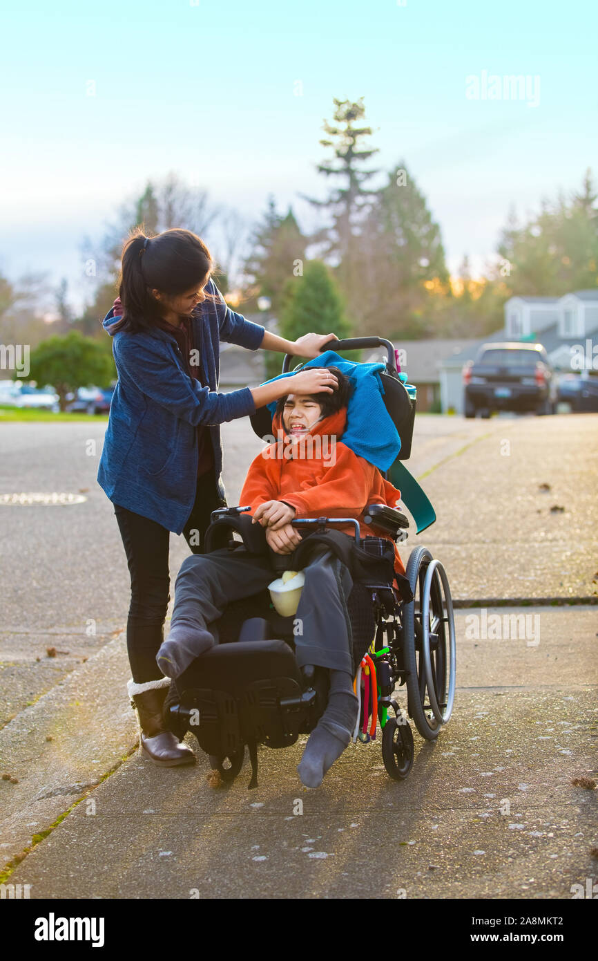 Sad Child In Wheelchair