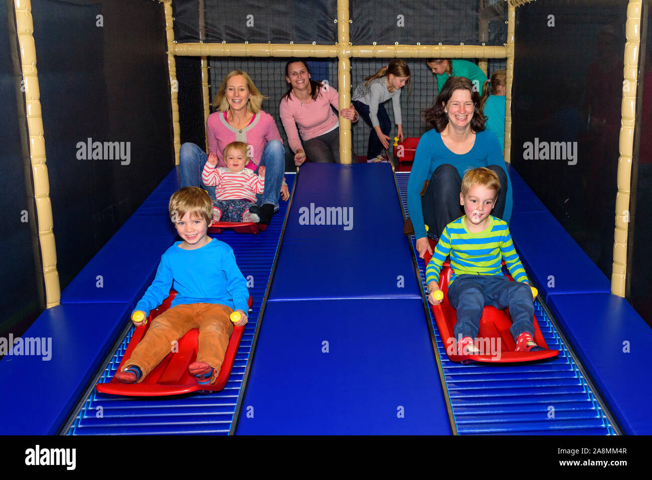 Sliding fun hi-res stock photography and images - Alamy