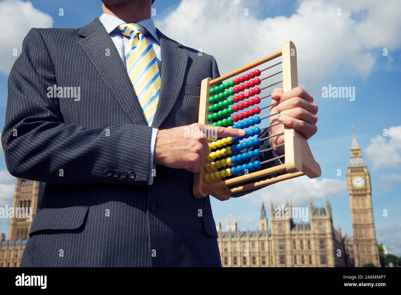 Politician holding an abacus counting election votes in front of the ...