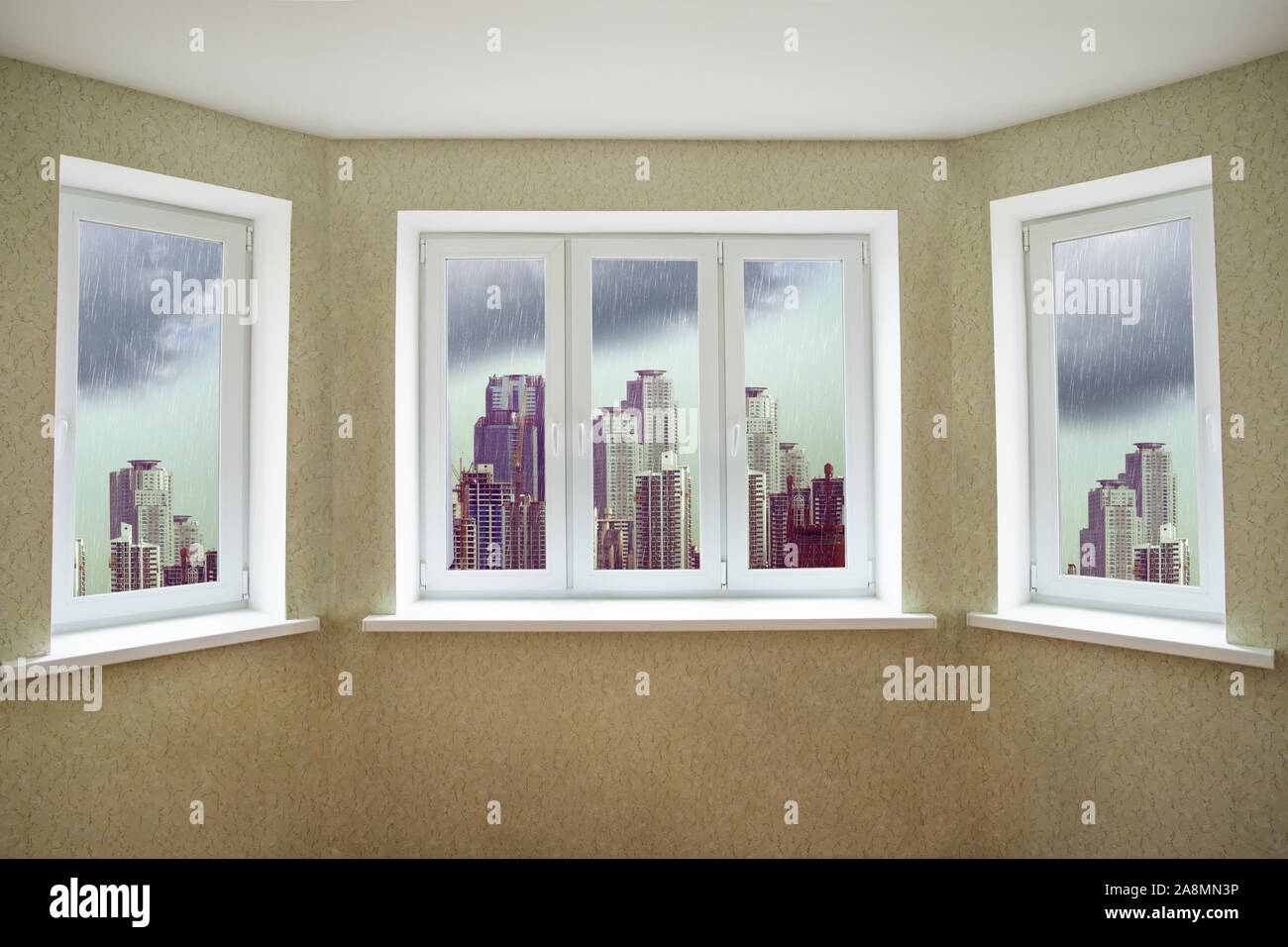 View through a modern PVC window onto rainy city landscape Stock Photo ...
