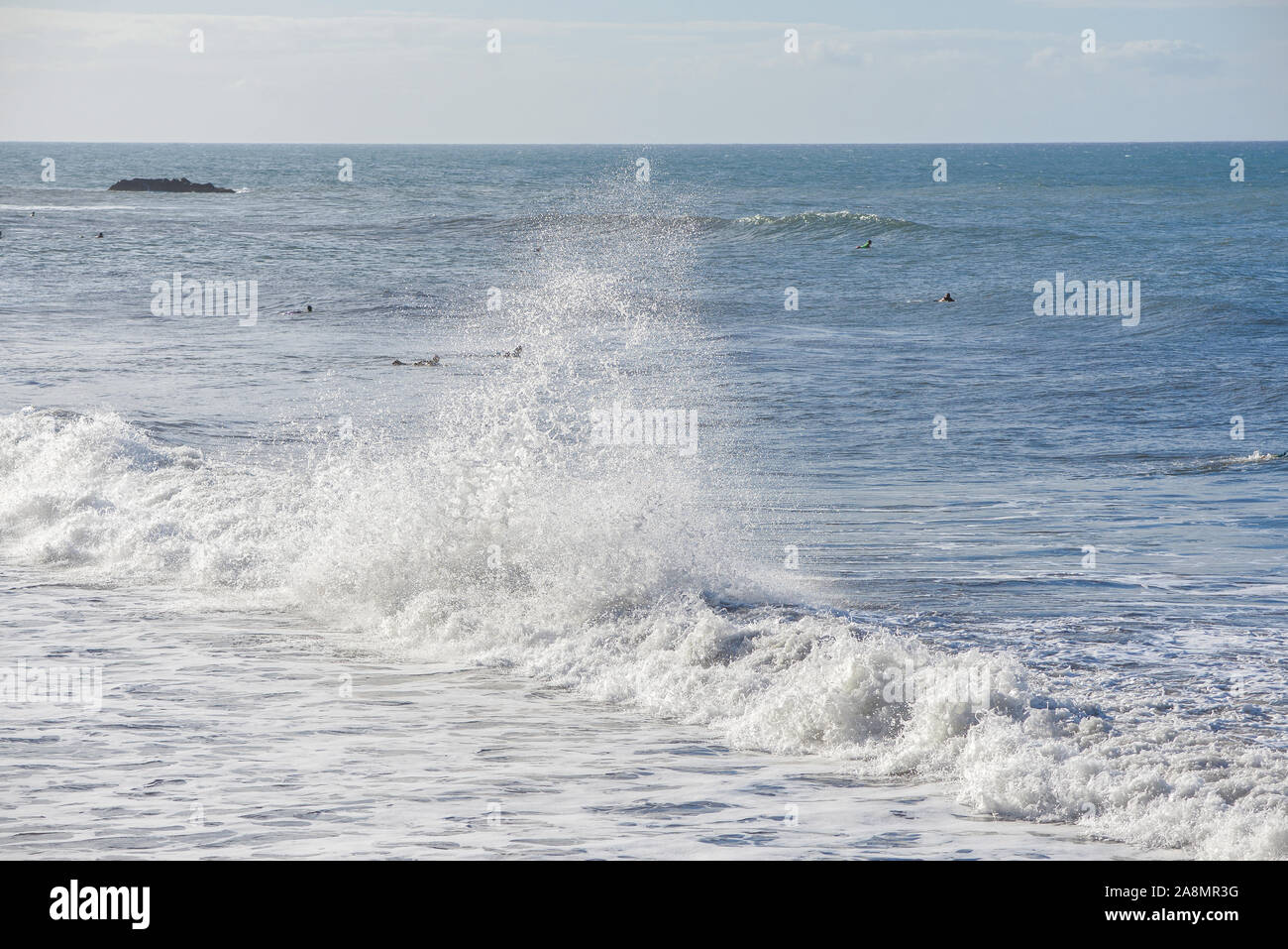 Wave on a beach with black sand, Tahiti, French Polynesia Stock Photo ...