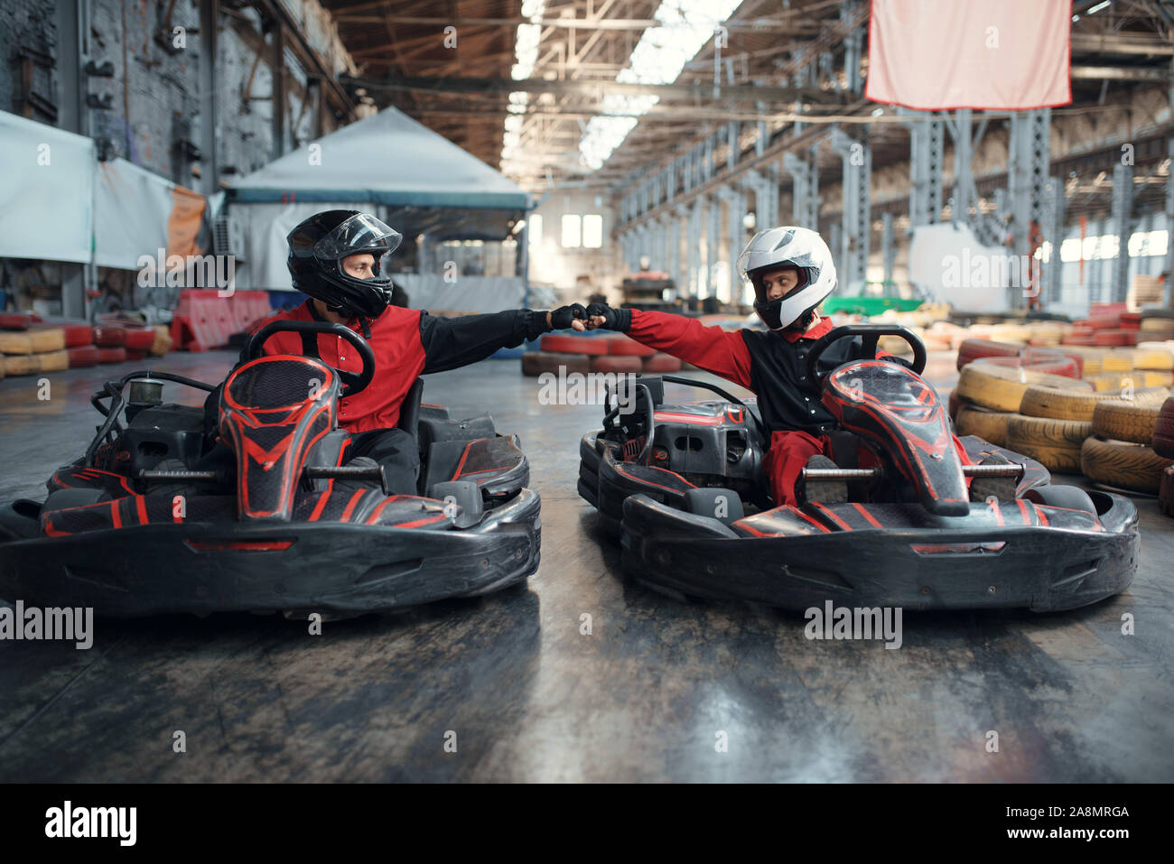 Two kart racers on start line, karting auto sport Stock Photo - Alamy