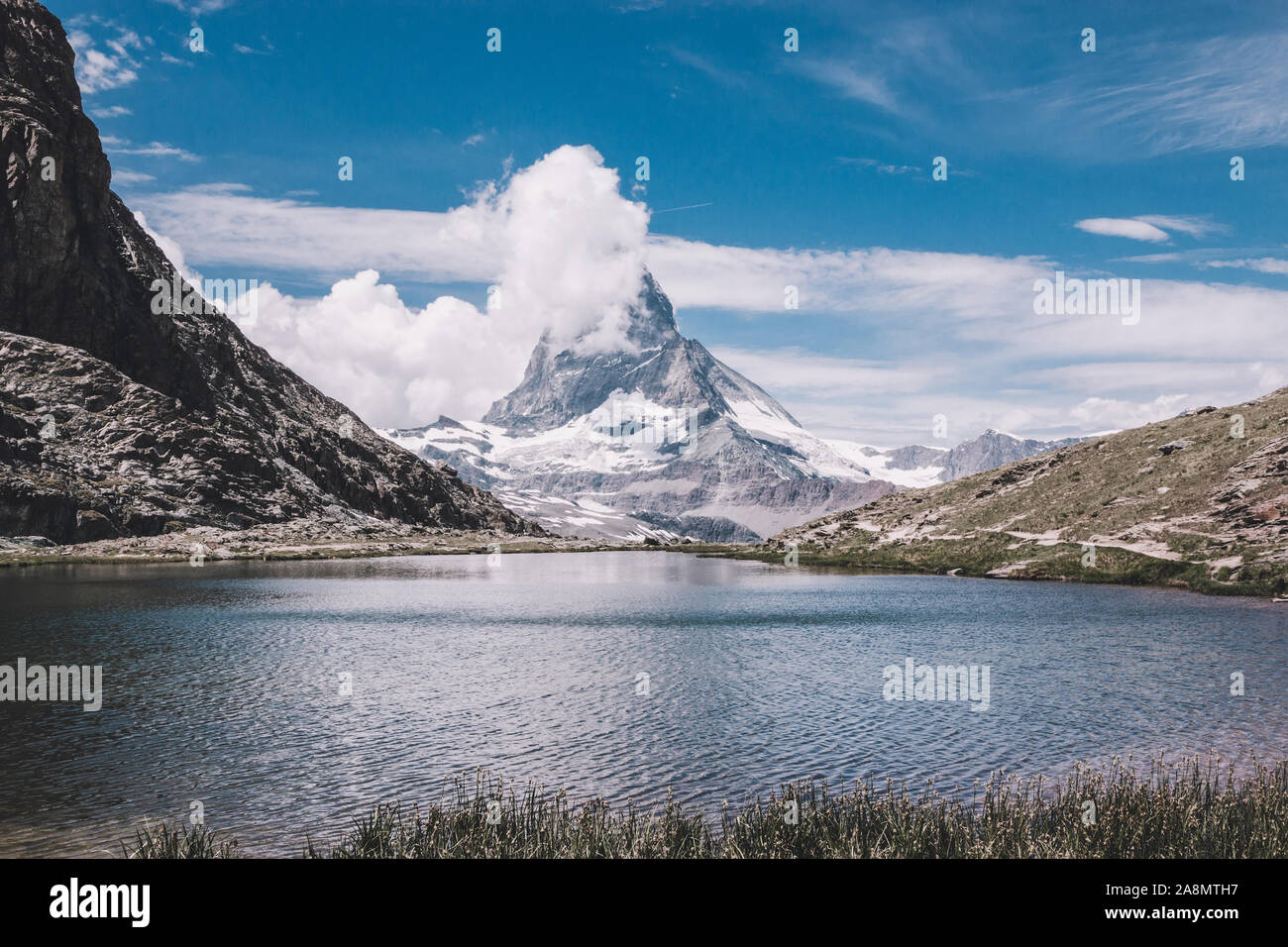 Panorama of Riffelsee lake and Matterhorn mountain, scene in national ...