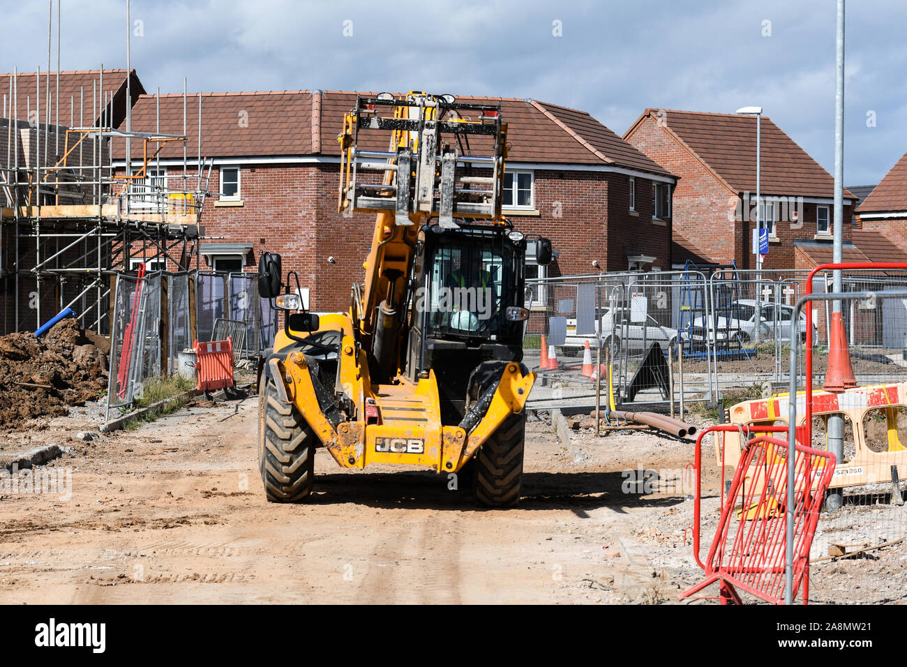an excavator on a building site Stock Photo - Alamy