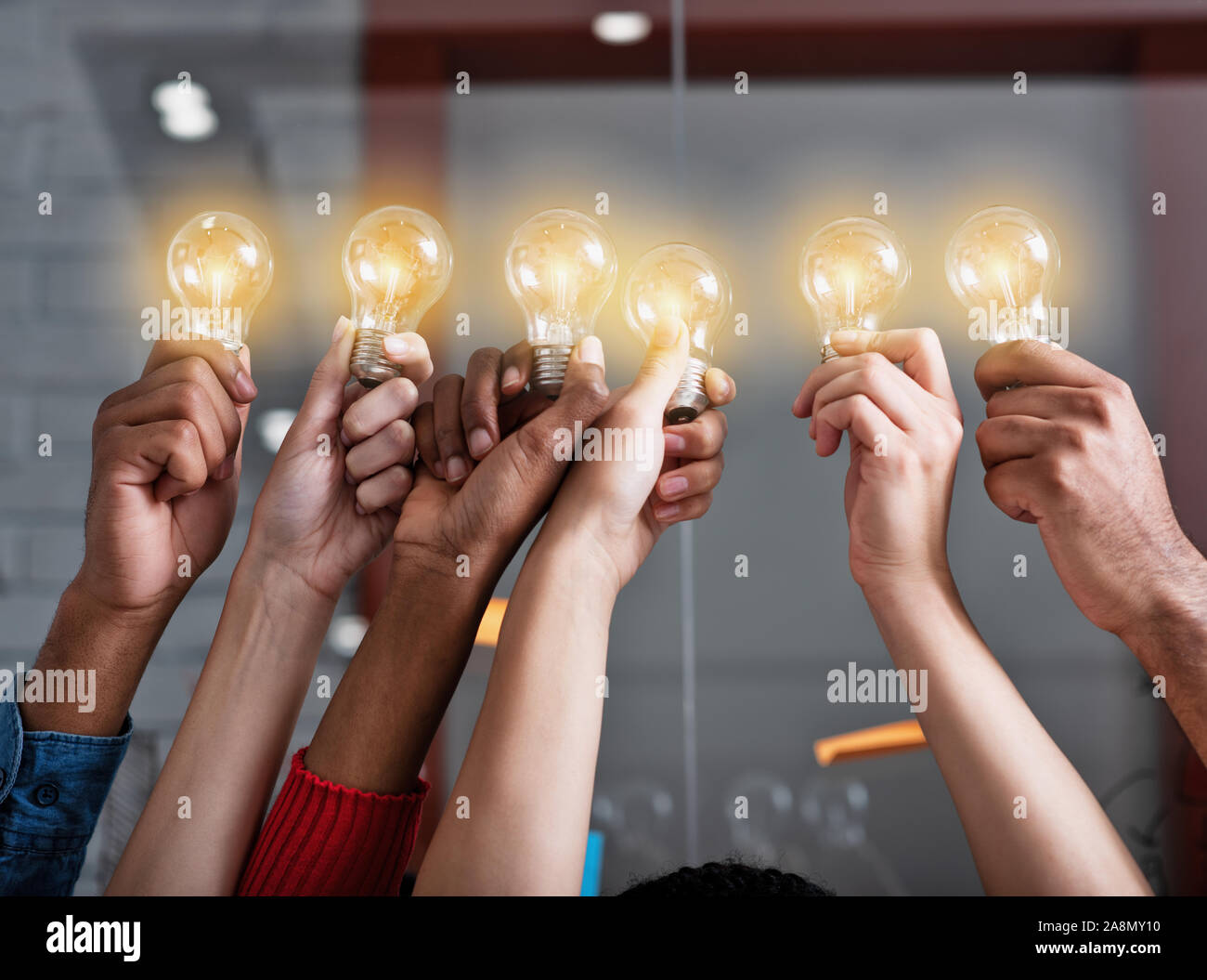 Teamwork and brainstorming concept with businessmen that share an idea ...