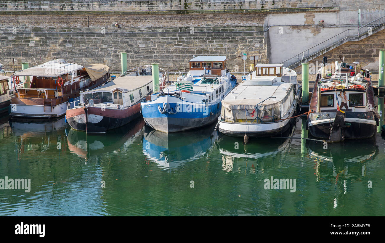 Paris, Bastille harbor, houseboats and quay with buildings Stock Photo ...