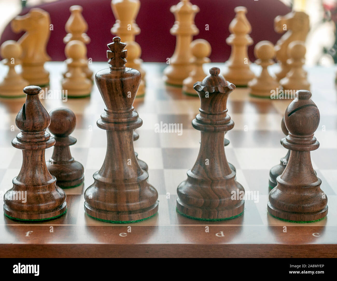 Queen surrounded pawn chess pieces hi-res stock photography and images ...