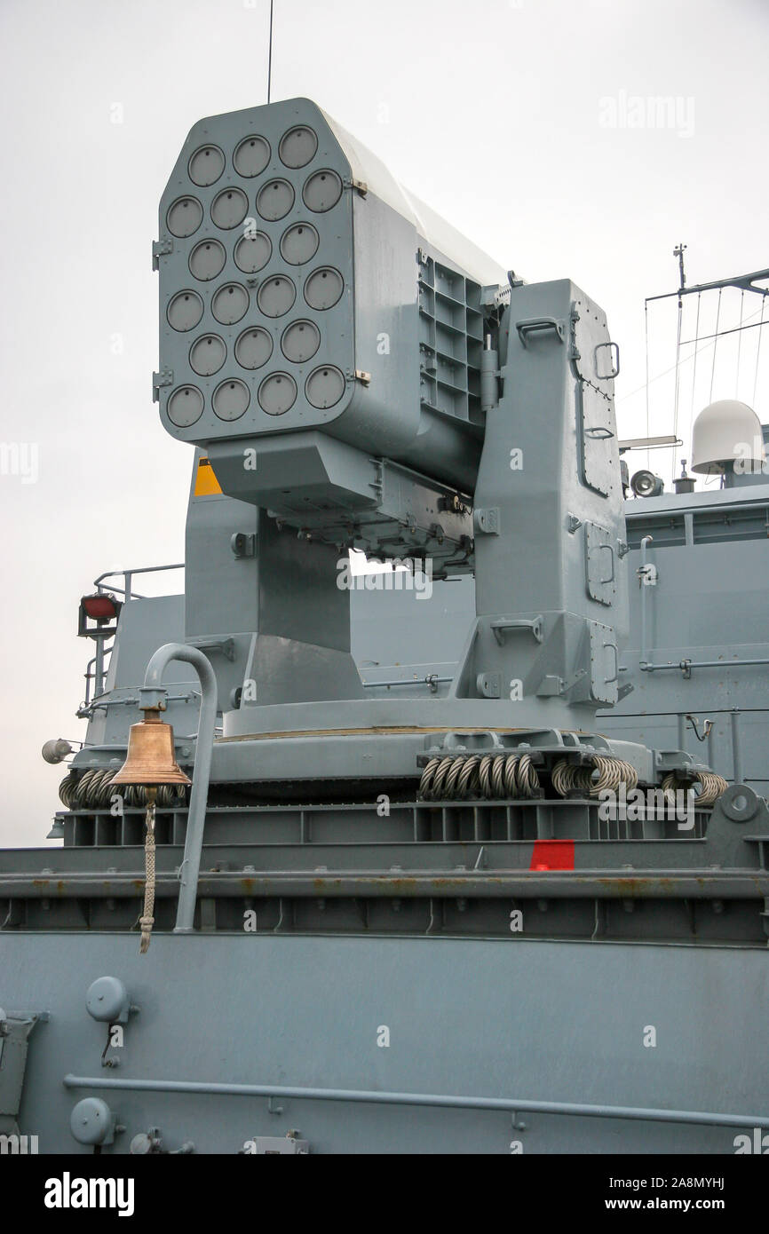 Multi-barrel missile launcher on a NATO ship. Many gun barrels. An ...