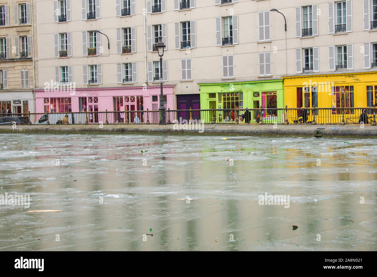 Paris, canal Saint-Martin, frozen channel on the quay in winter, with ...