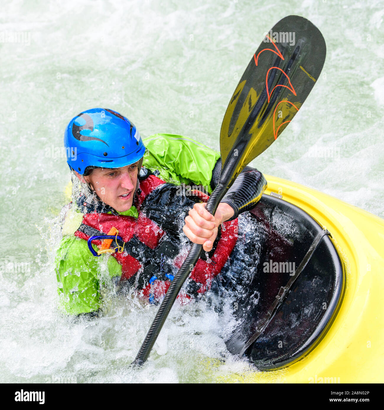 Kayaking on an artificial wild water channel Stock Photo - Alamy