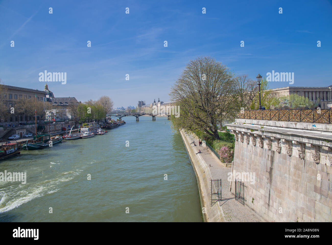 France, pairs city architecture and river seine and man sitting at ...