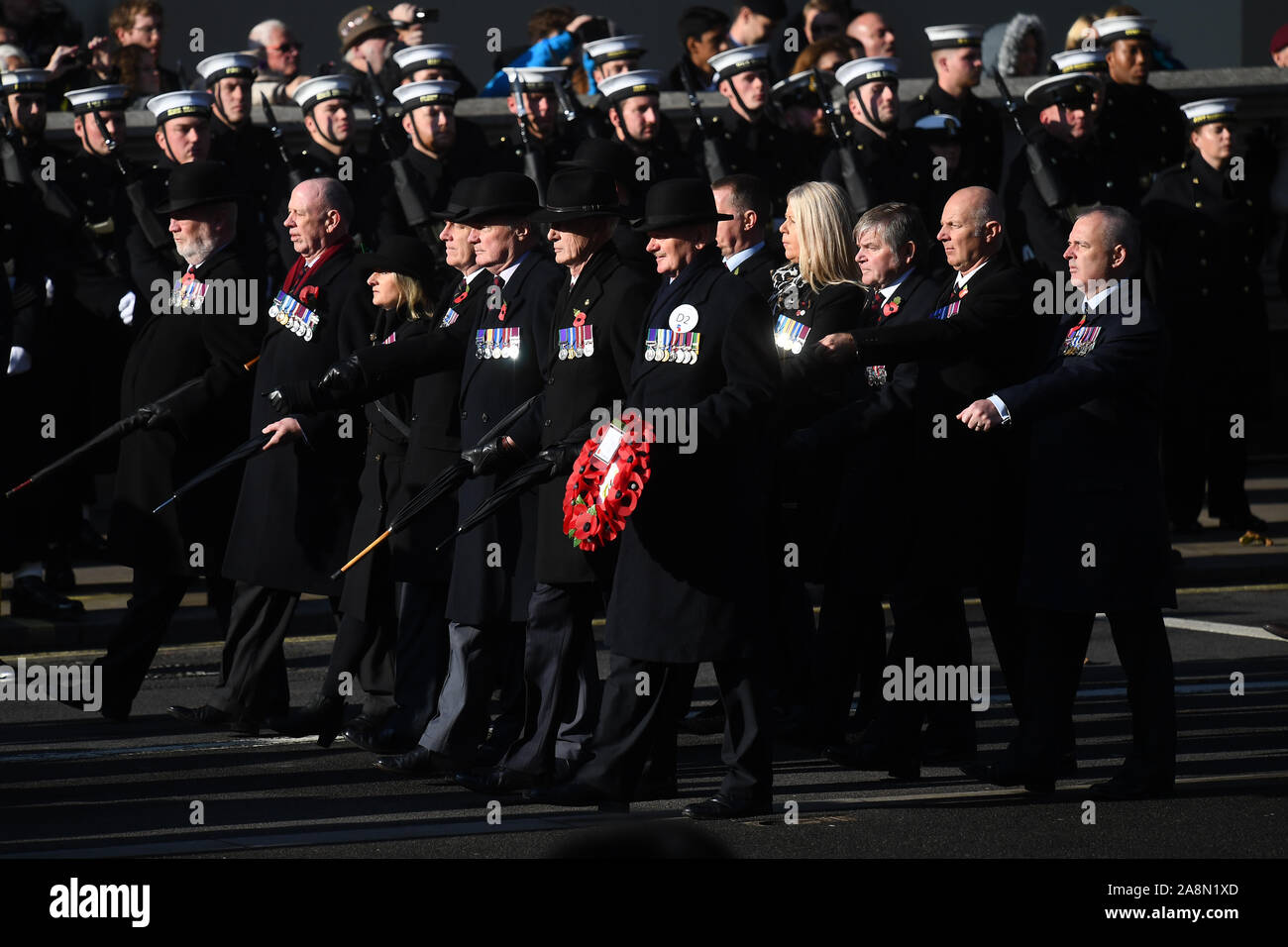 Veterans march past during the Remembrance Sunday service at the ...