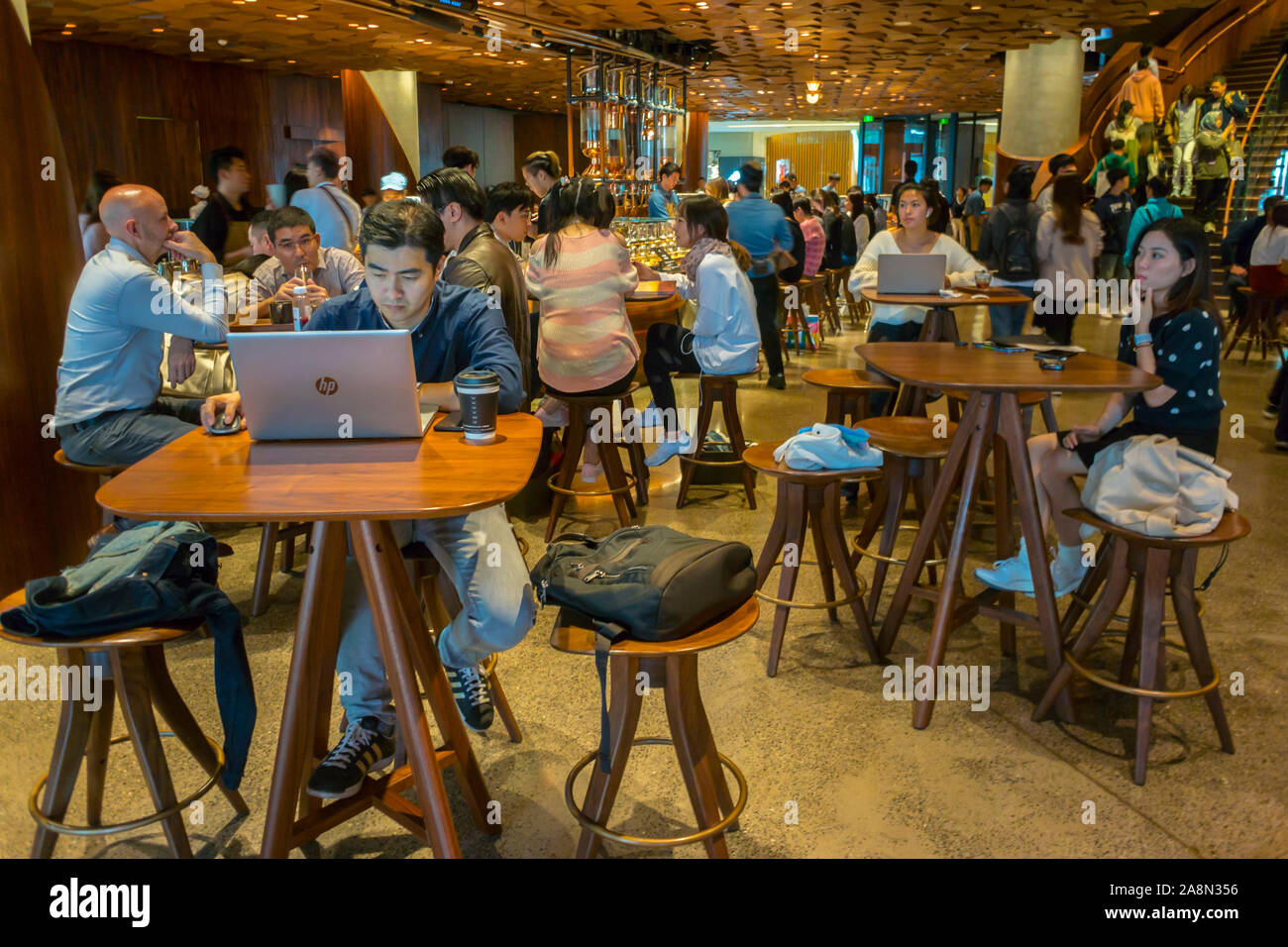 Crowd people inside tables hi-res stock photography and images - Alamy
