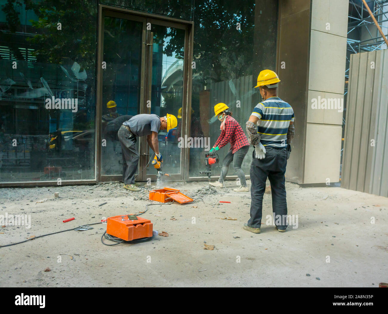 Small Group People, Men, Chinese Construction Workers on Site, doorway ...