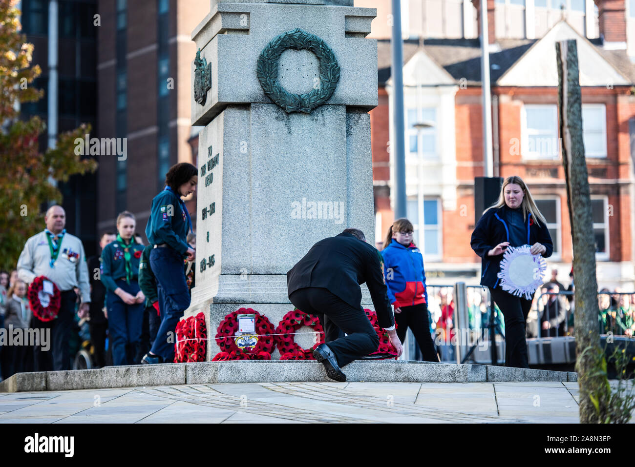 Veterans and civilians lay reefs and notes of condolence to the fallen ...
