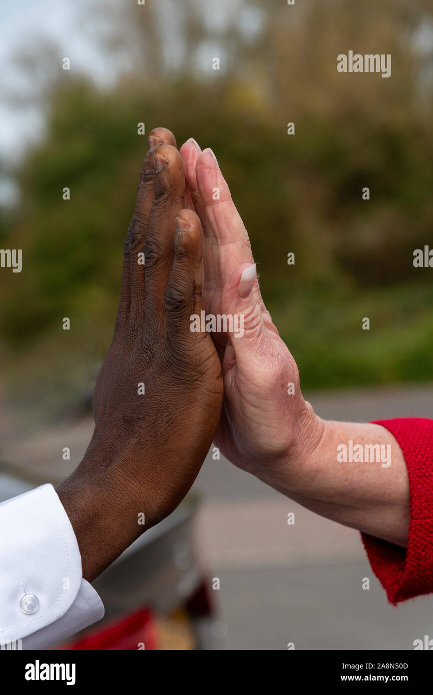 High five hands hi-res stock photography and images - Alamy