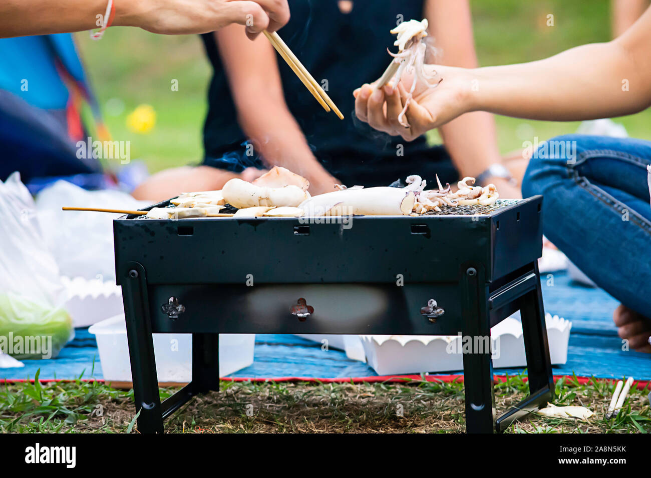 Charcoal grilled squid hi-res stock photography and images - Alamy