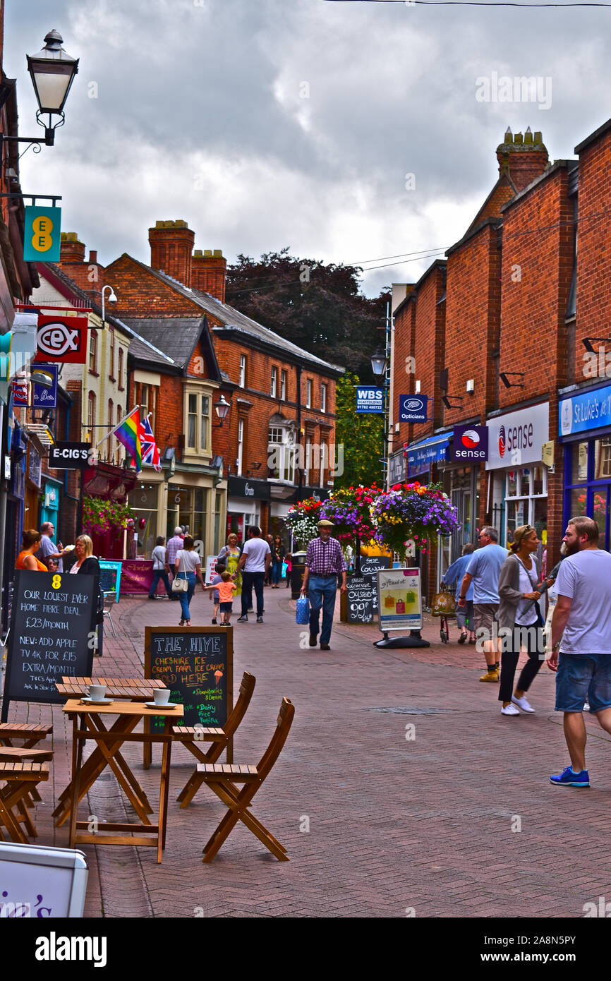 A view of shoppers strolling along Pepper Street in the historic market ...