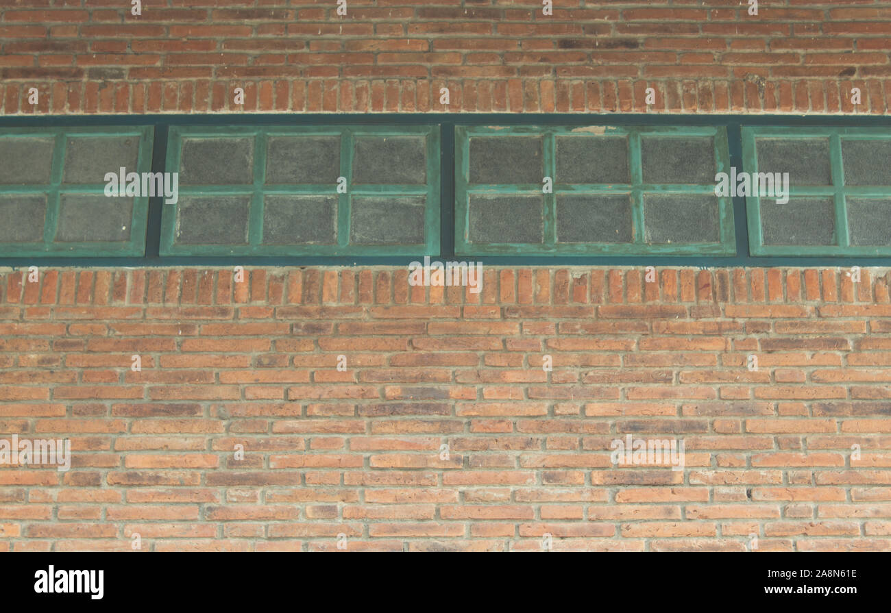Striped brick walls and wooden window is used as the background Stock ...