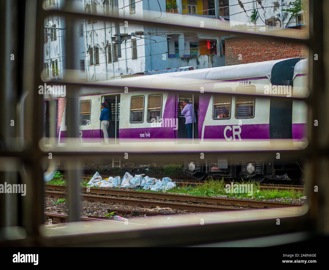 Mumbai, India - October 28,2019 : Unidentified passengers standing on ...