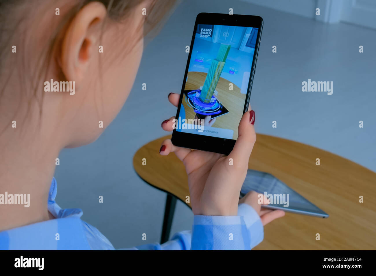 Woman using smartphone with architectural augmented reality app Stock ... Woman using smartphone with architectural augmented reality app Stock ...