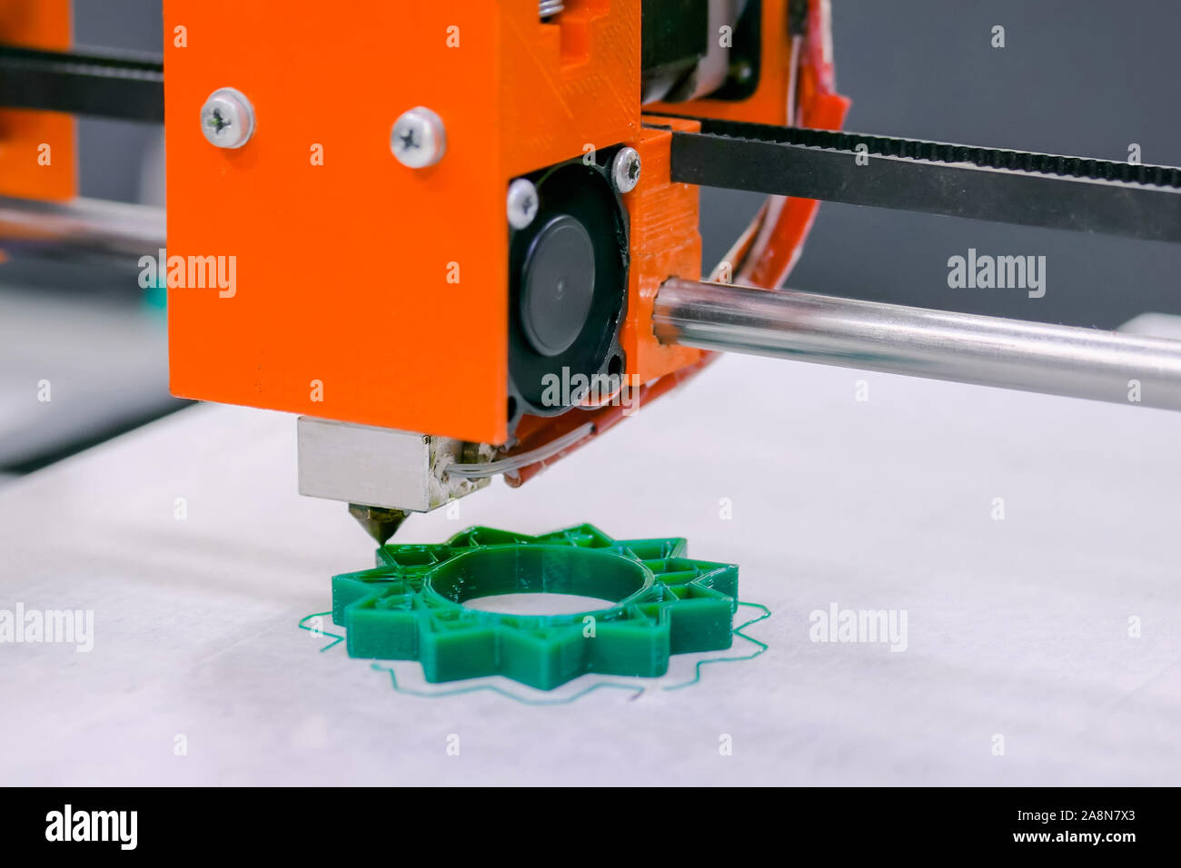 Automatic 3D printer machine working at modern technology exhibition ...