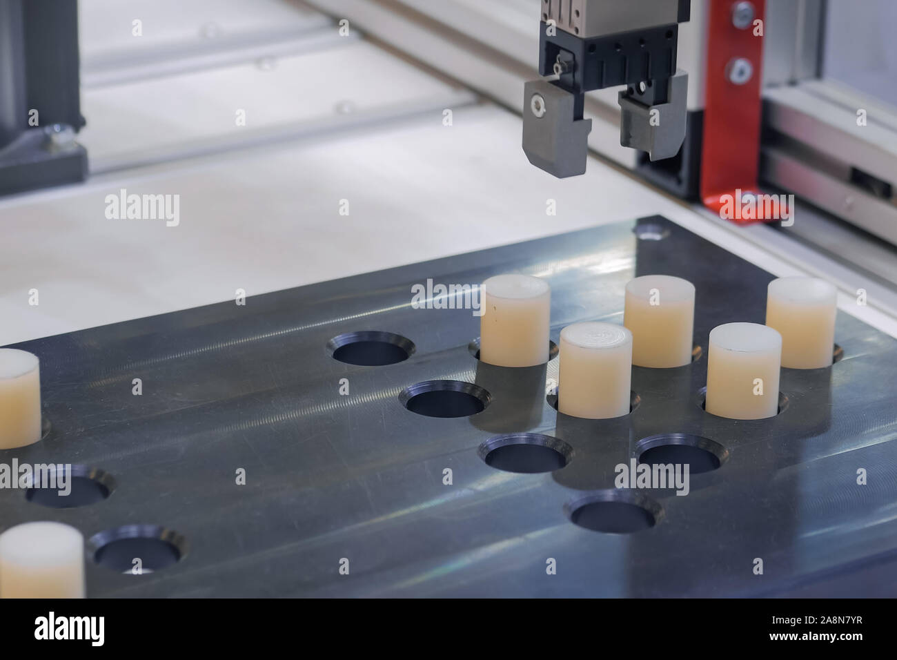 Automated robotic clamp arm, robot hand during work at exhibition ...