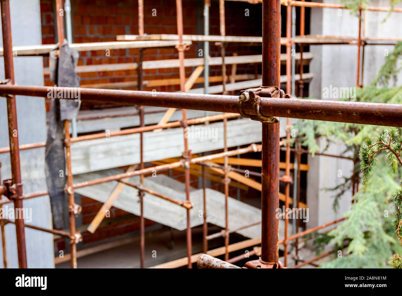 Scaffold is placed against edifice, building under construction Stock ...