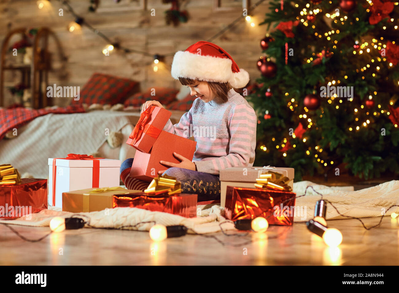 Child receiving gift hi-res stock photography and images - Alamy