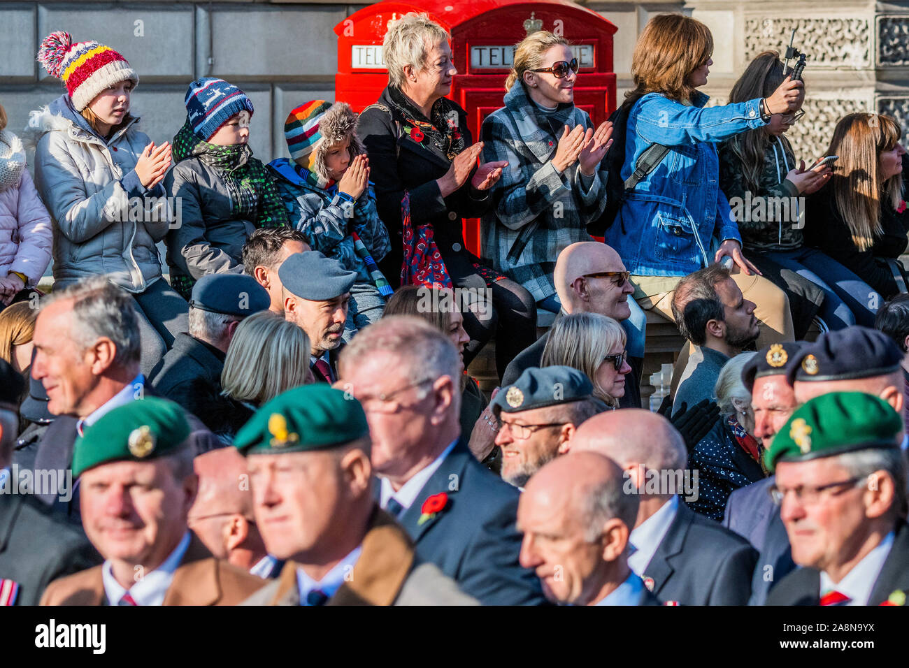 London, UK. 10th Nov, 2019. The veterans march past to applause from ...