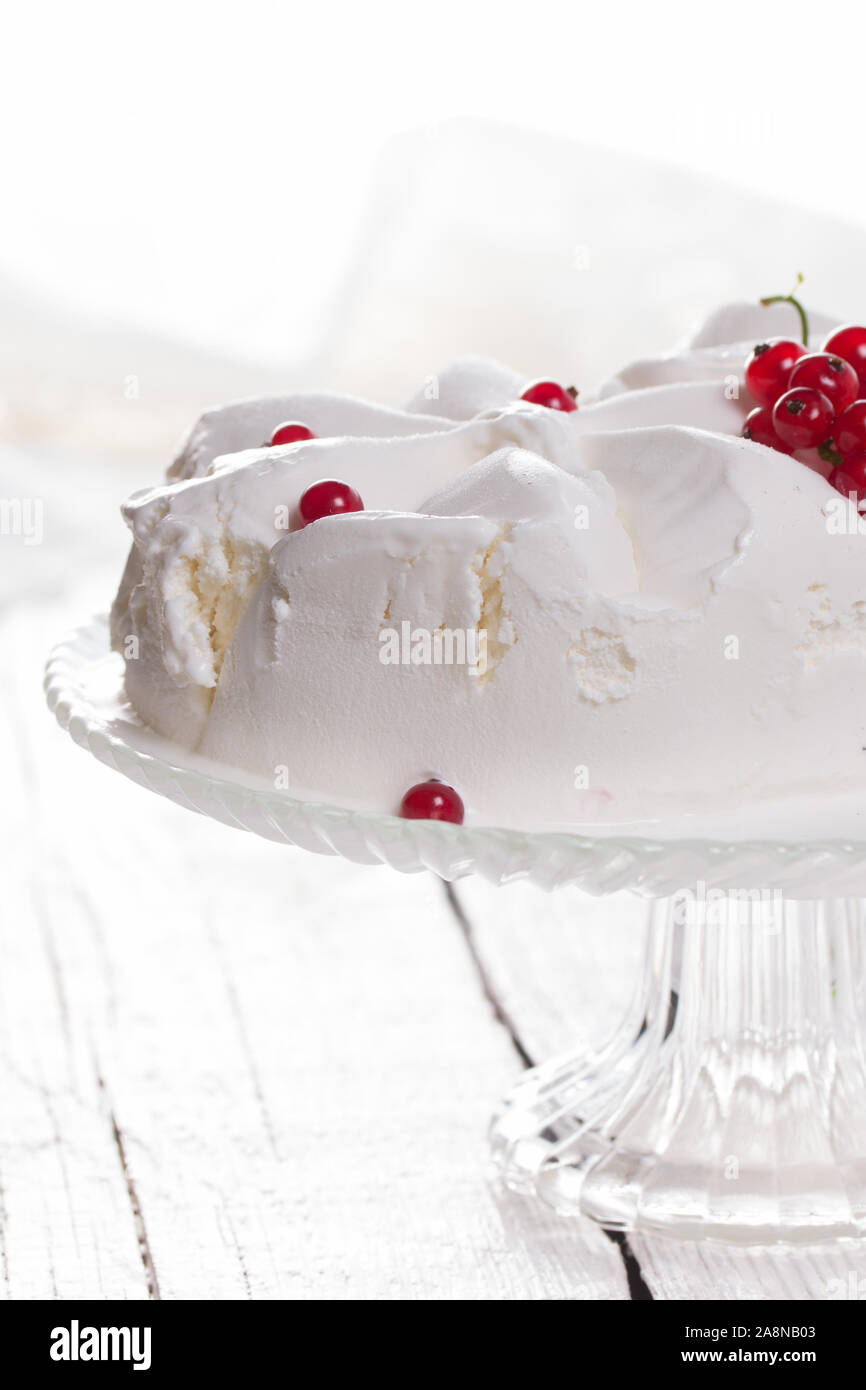 Vanilla ice cream with red currant on white background Stock Photo - Alamy